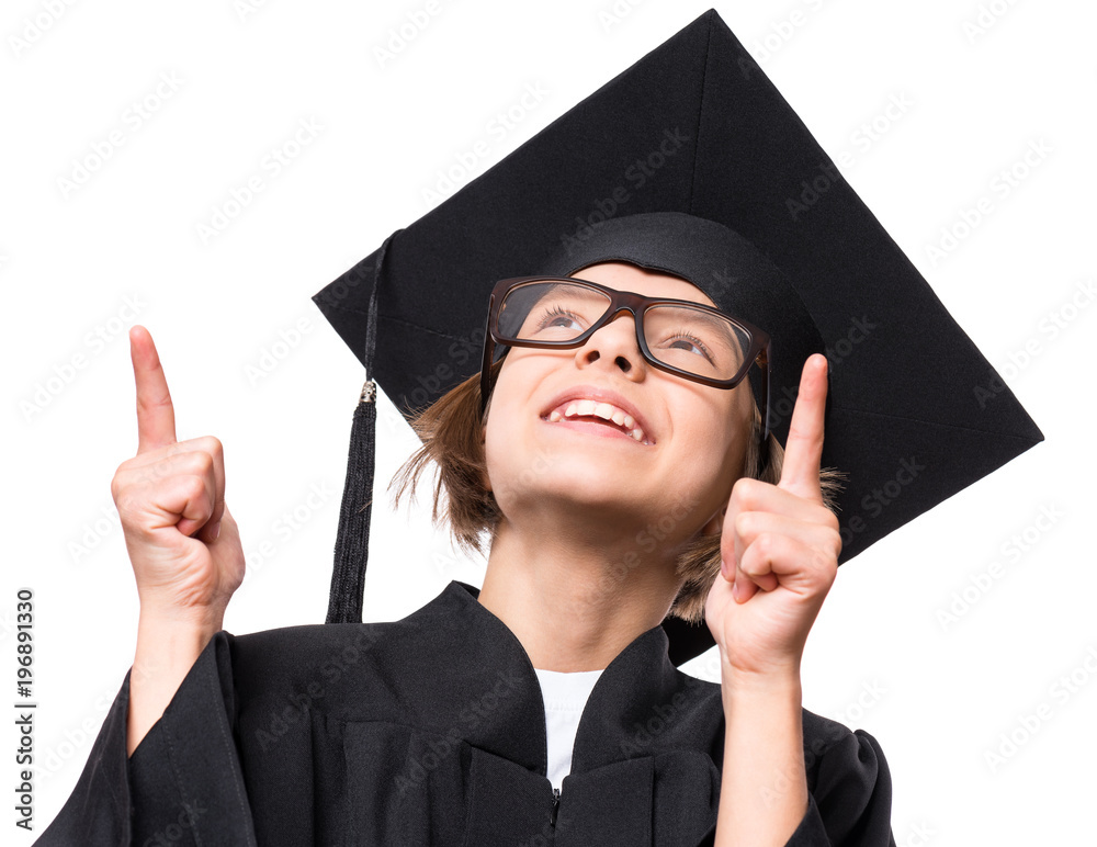 Portrait of happy graduate little girl student in black graduation gown ...
