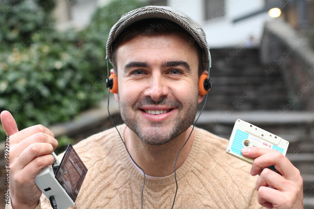 Guy listening to Stereo cassette Walkman in the 80s or the 90s ภาพถ่าย ...