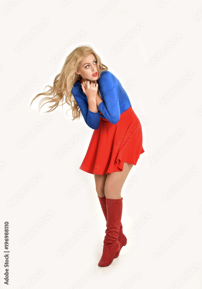 full length portrait of pretty girl wearing super hero costume ...