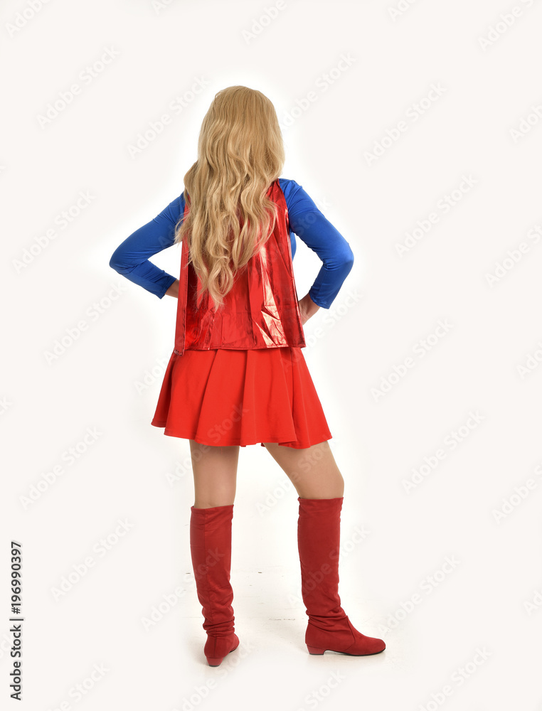 full length portrait of pretty girl wearing super hero costume ...