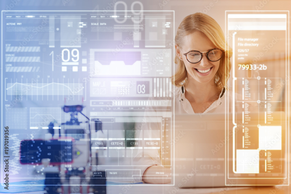 Feeling happy. Cheerful young emotional engineer feeling happy while ...