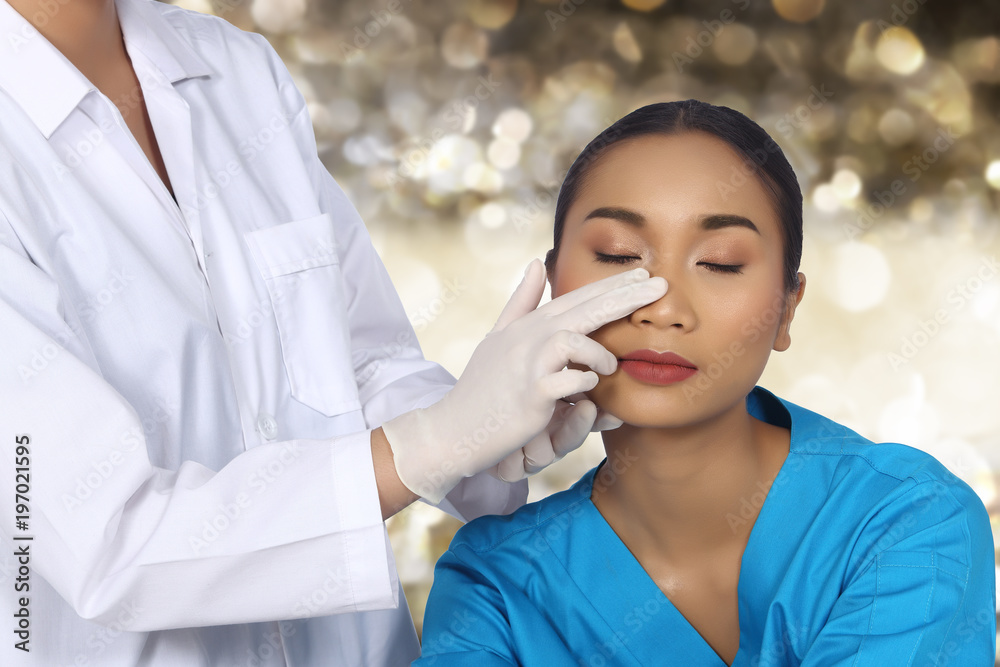 Doctor Nurse check face nose structure before plastic surgery Stock ...