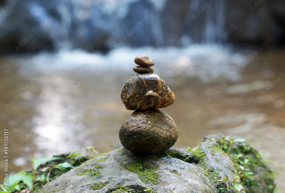 balance of zen stone and waterfall Stock Photo | Adobe Stock