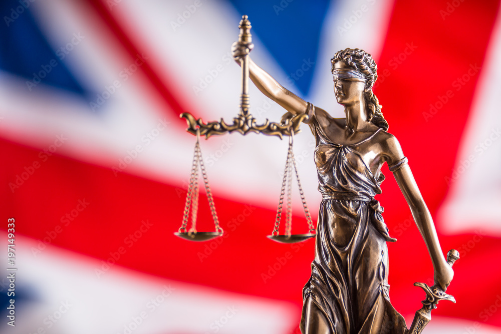 Lady Justice and United Kingdom flag. Symbol of law and justice with UK ...