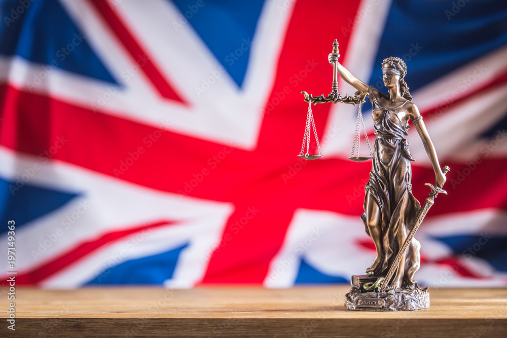 Lady Justice and United Kingdom flag. Symbol of law and justice with UK ...