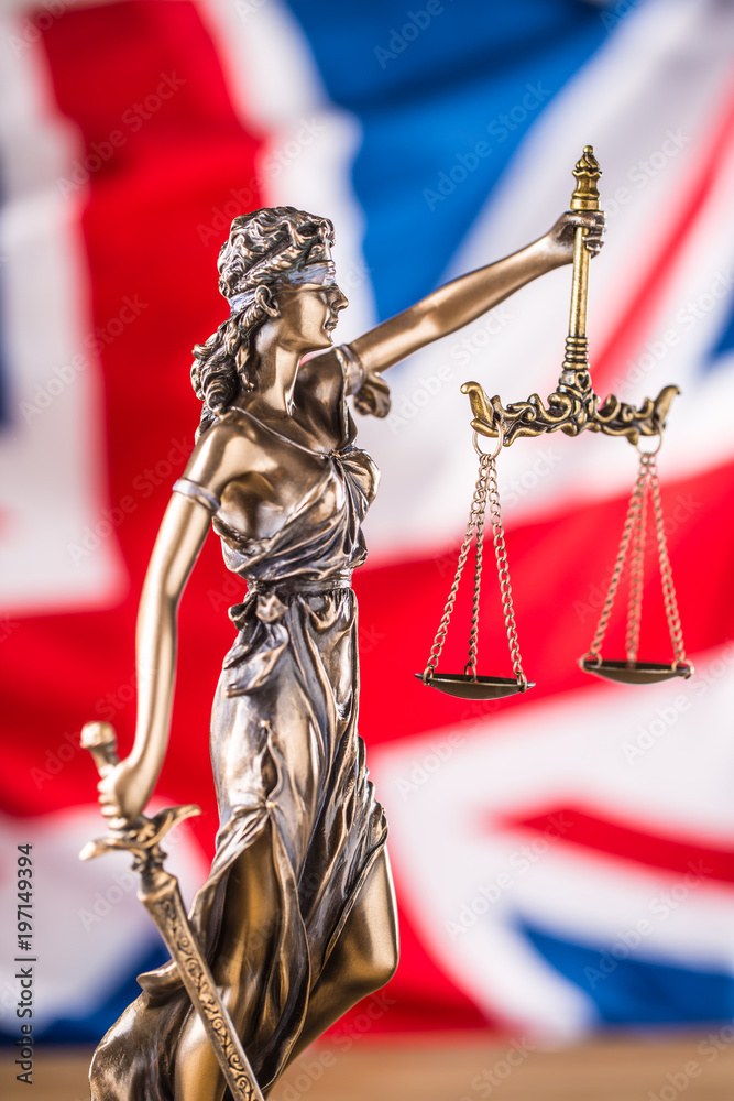Lady Justice and United Kingdom flag. Symbol of law and justice with UK ...