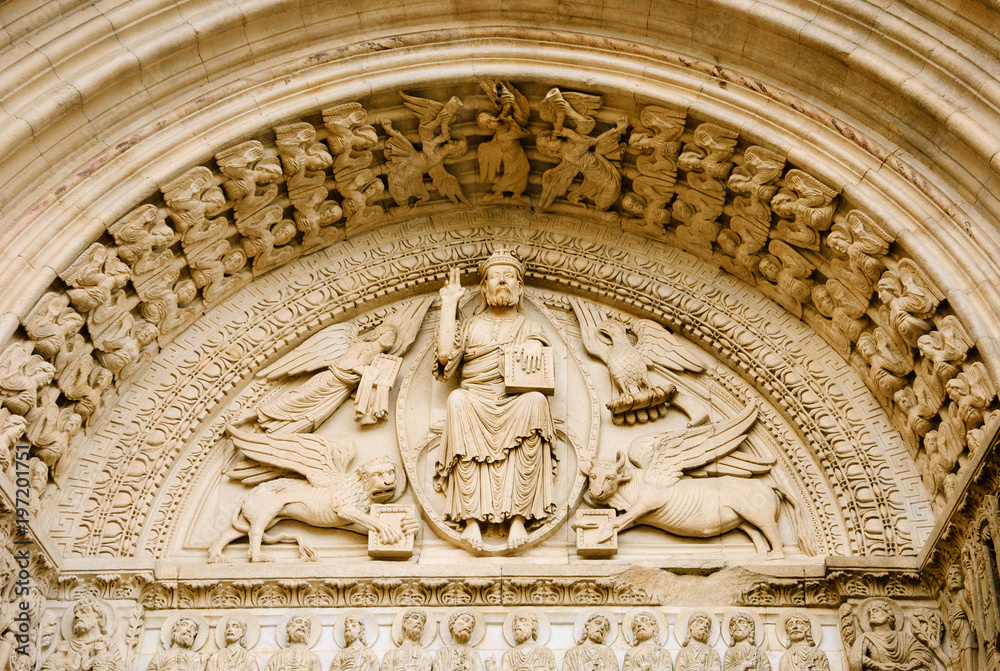 Church of St. Trophime in Arles. Jesus Christ surrounded by Four Evangelists (represented as ...