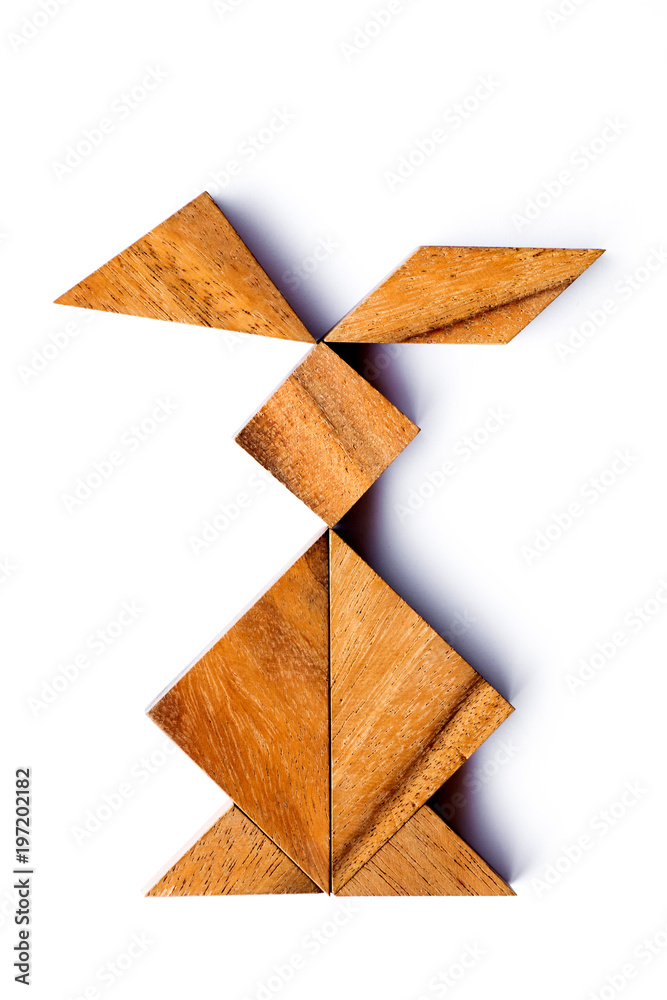Wood tangram puzzle in rabbit shape on white background Stock Photo ...