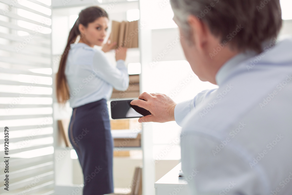 Digital camera. Selective focus of a modern smartphone being used for ...