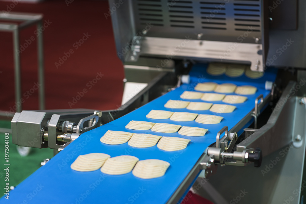 Food high technology manufacturing with automatic machine Stock-Foto ...