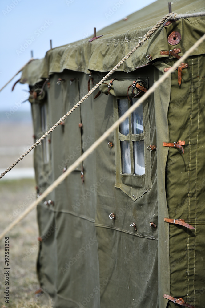 Green military tent detail shot Stock Photo | Adobe Stock