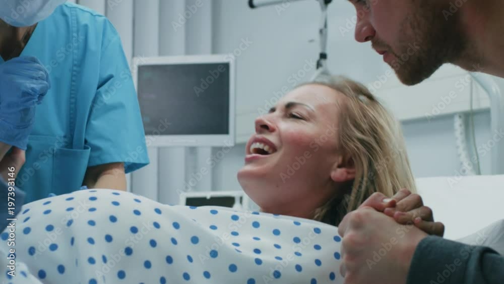 Close-up on a Face of a Woman in Labor Pushing Hard to Give Birth ...