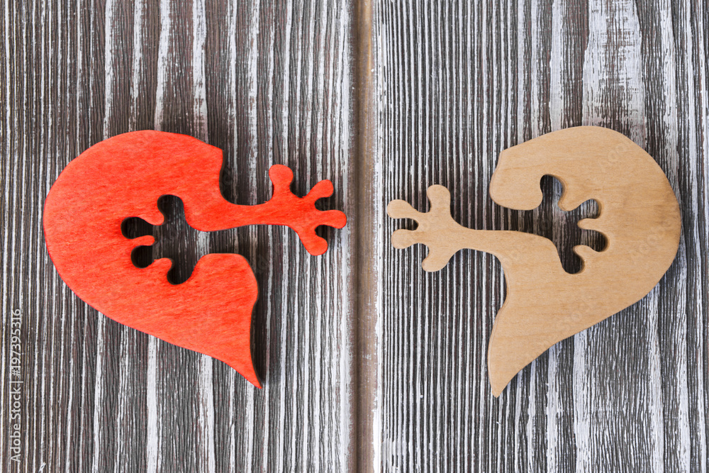 two halves of a heart on a wooden background. love. Stock Photo | Adobe ...