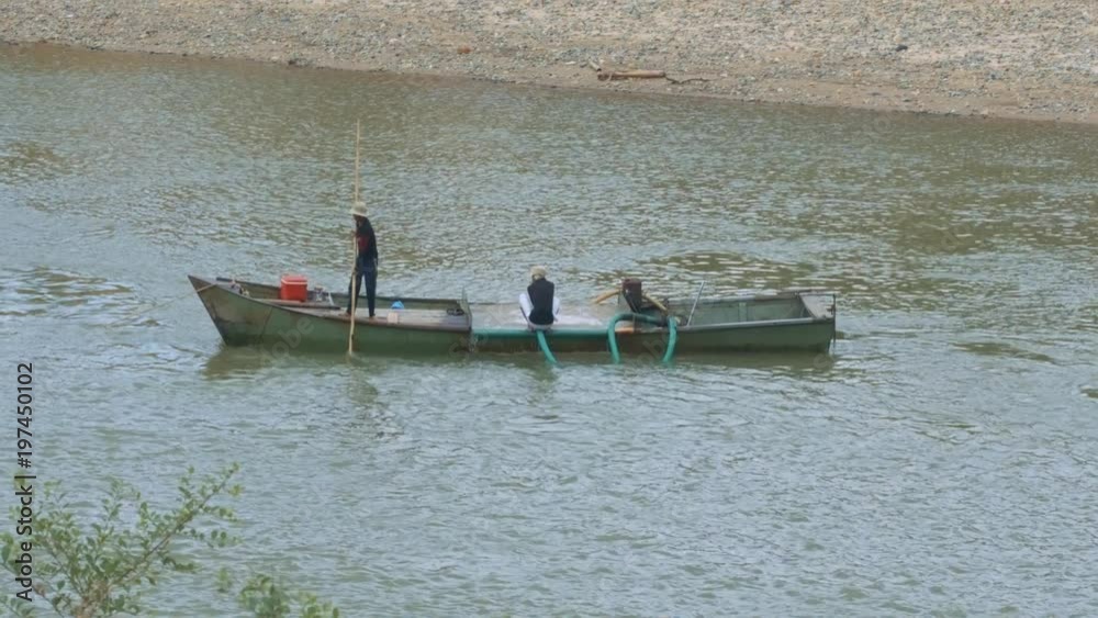 Local Men Extract Sand out of River into Flatboat Stock Video | Adobe Stock