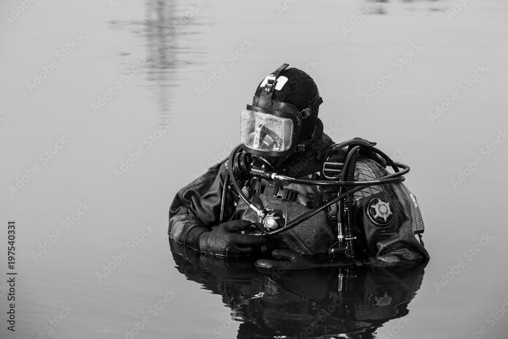 brave diver rescuer comes out of the water Stock Photo | Adobe Stock