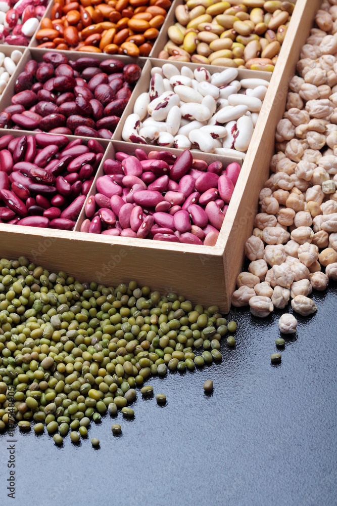Different types of legumes beans. In wooden box.Varieties of beans.Top ...