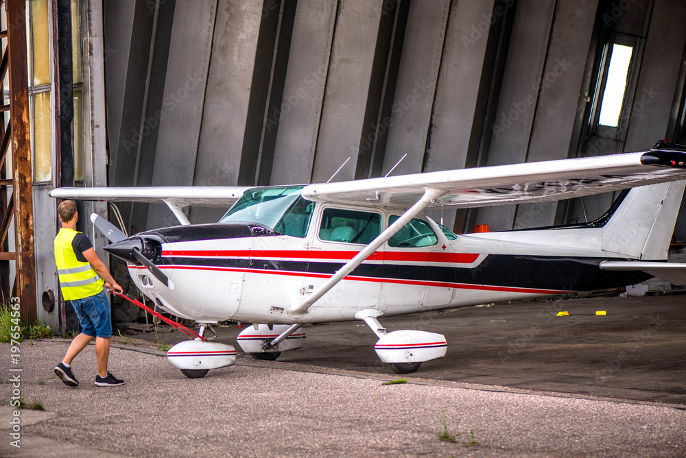 Single engine aircraft, ultra light plane ready for flight. Pilot is ...