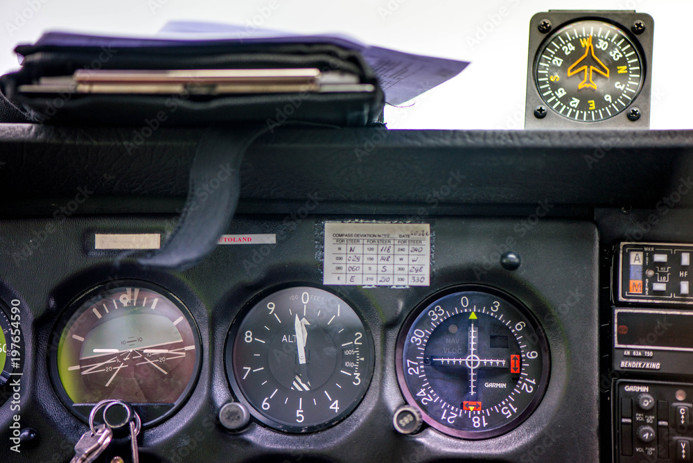 Detail of old airplane cockpit. Aircraft equipment, various indicators ...