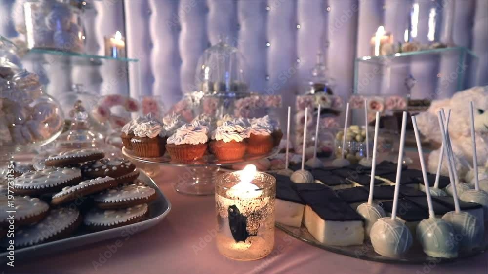 Candy bar in the restaurant, children's party, birthday, lighted candle ...