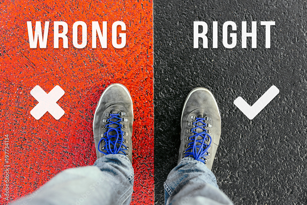 Concept of facing a crucial decision about wrong and right shown by ...