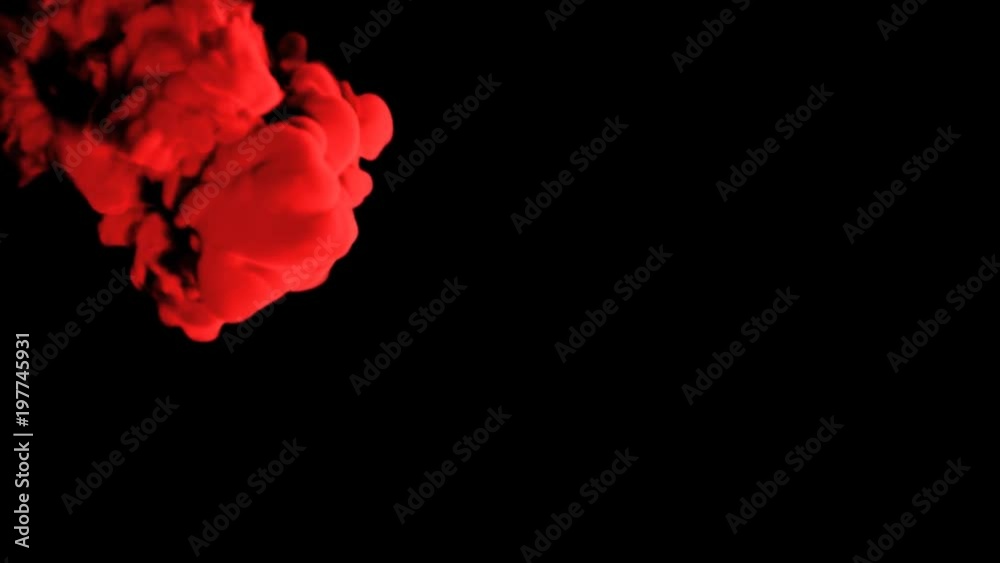 Abstract stylized Red ink drop in water on a black background for ...