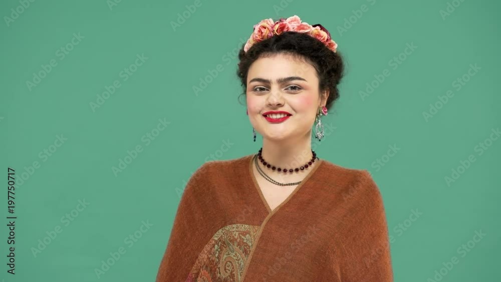 Vidéo Stock Beautiful portrait of woman with thick eyebrows Frida Kahlo ...