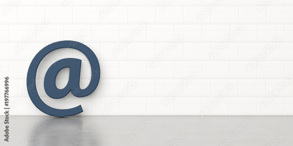 E-Mail At-Zeichen steht vor einer Kalksandsteinmauer - Symbol für ...