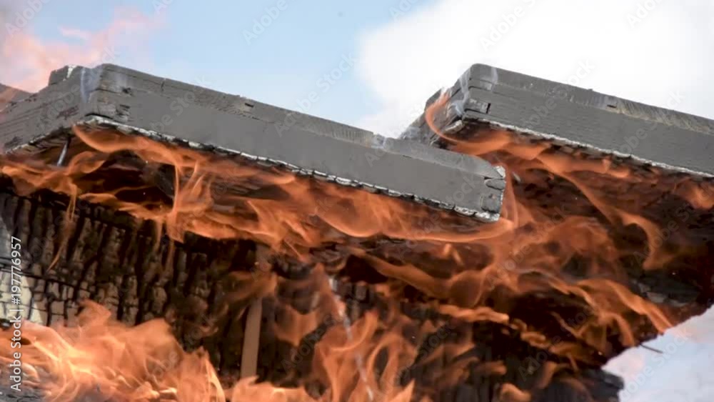 Burning wooden military crates from ammunition. Burning fire. The ...