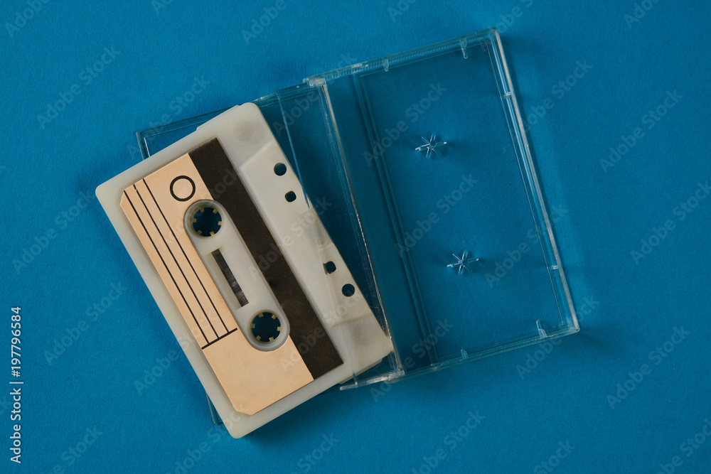 Blank cassette tape box on blue background. Vintage cassette tape case ...