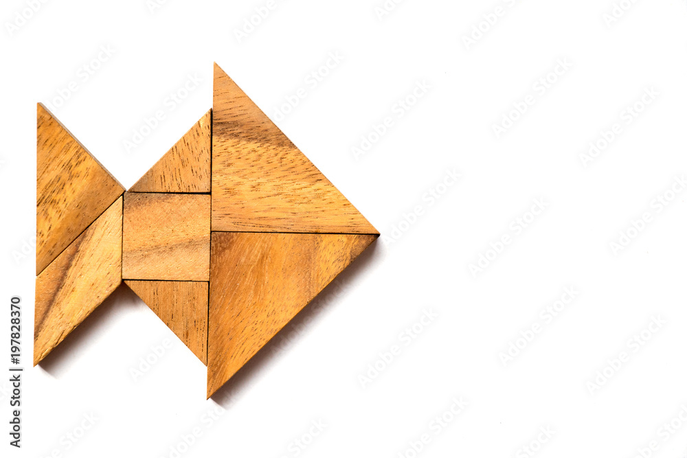 Wooden tangram puzzle in fish shape on white background Stock Photo ...