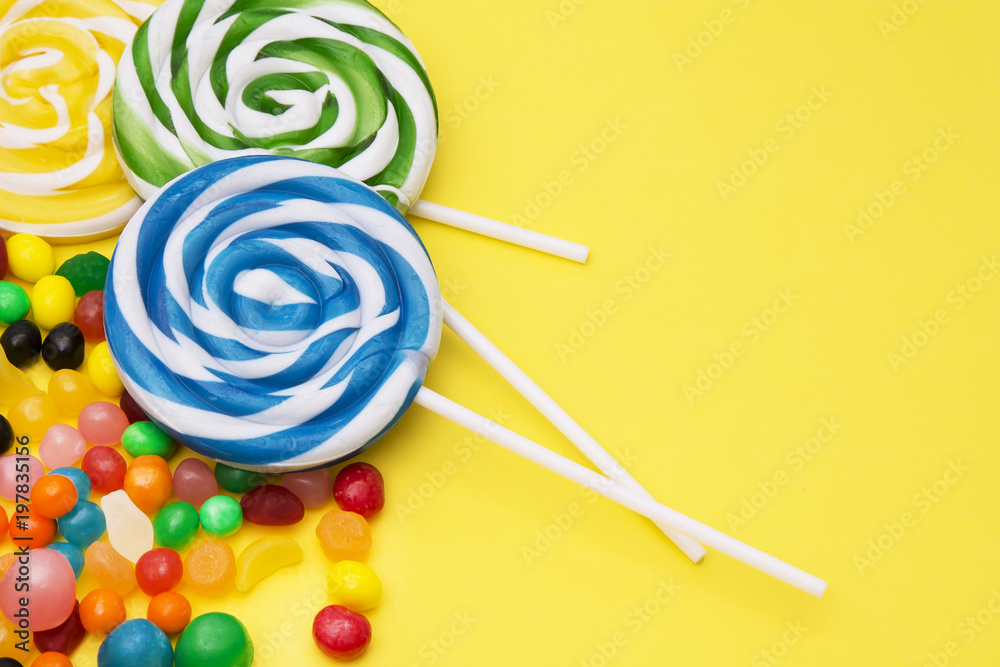 colorful spiral lollipops on colorful backgrounds Stock Photo | Adobe Stock colorful spiral lollipops on colorful backgrounds Stock Photo | Adobe Stock
