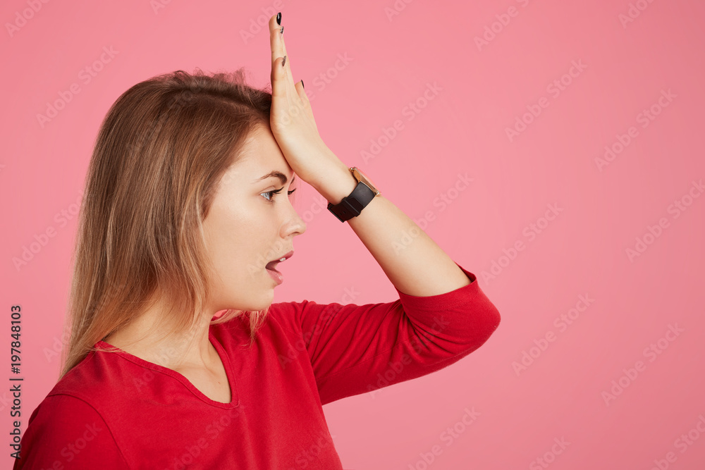 Sideways portrait of forgetful woman remembers something important ...