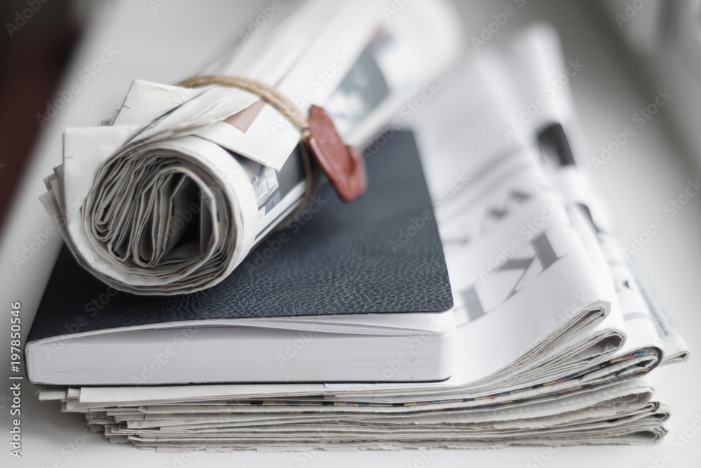 Pile Of Rolled Newspapers