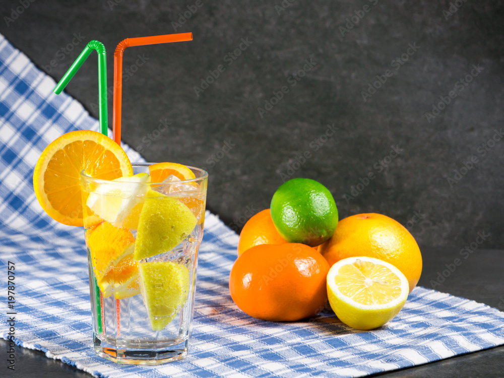 Fresh and juicy citrus fruits are ready for preparing of ice cold ...