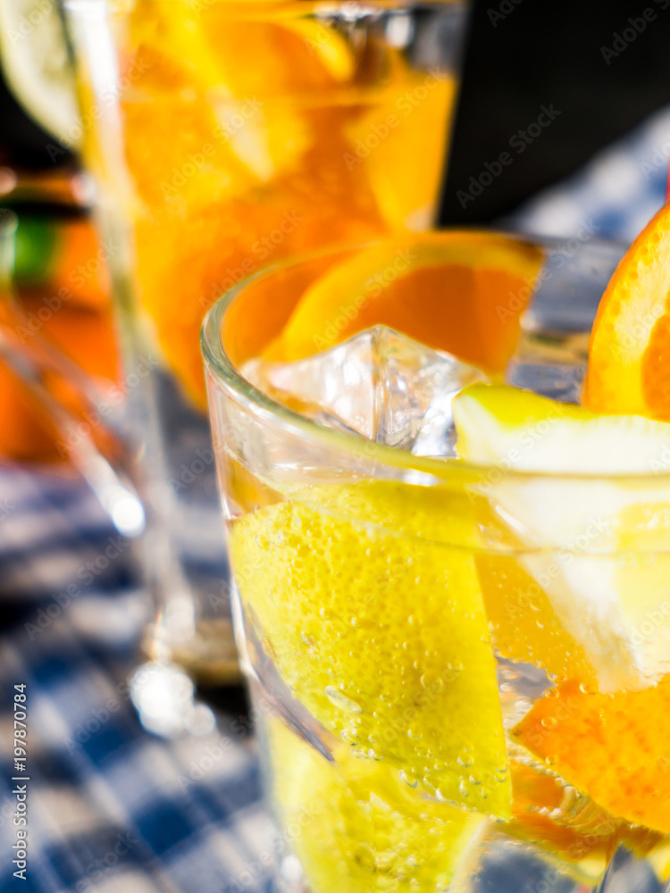 Fresh and juicy citrus fruits are ready for preparing of ice cold ...