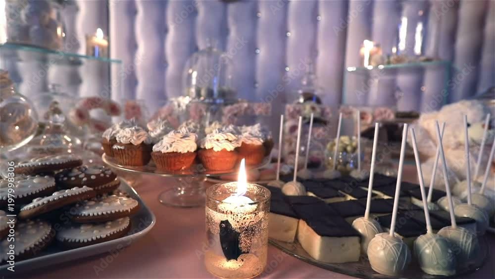 Candy bar in the restaurant, children's party, birthday, lighted candle ...