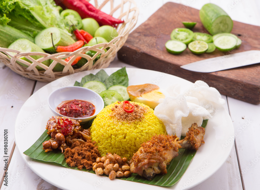 Nasi uduk: yellow turmeric rice with fried chicken, sweet and savory ...