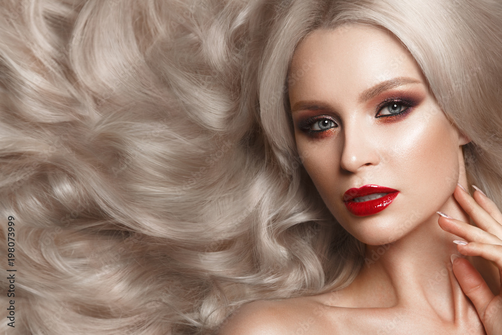 Beautiful Blonde In A Hollywood Manner With Curls Natural Makeup And