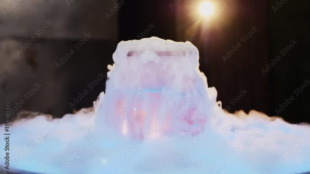 Experiment with dry ice. Large evaporation of dry ice from a glass ...