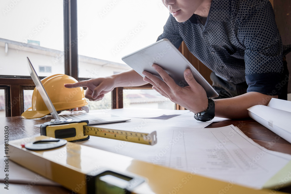 young engineers are use laptop notebook design modern project in the ...