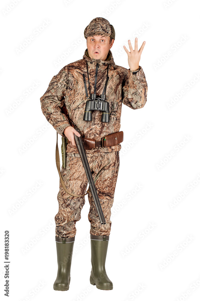 Full length portrait of a male hunter with double barreled shotgun ...