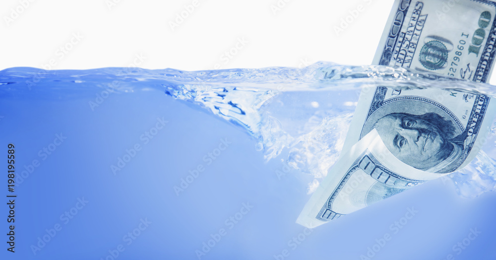 Money concept showing US Dollar sinking in water as a symbol of global ...