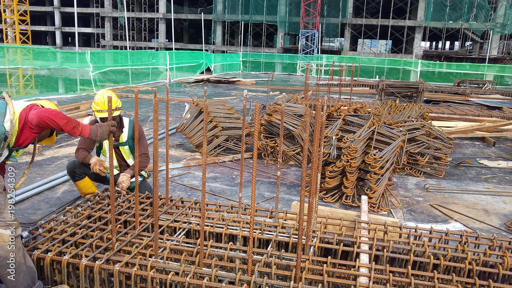 Construction workers fabricating steel reinforcement bar at the ...