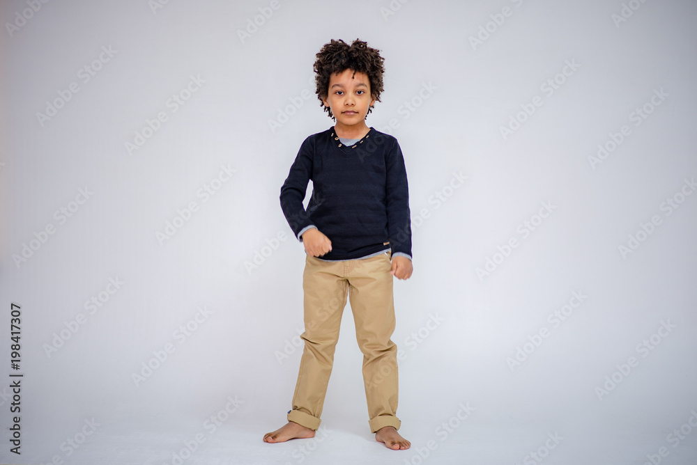 cute Lovely dark-skinned boy with age 6 years in different clothes ...