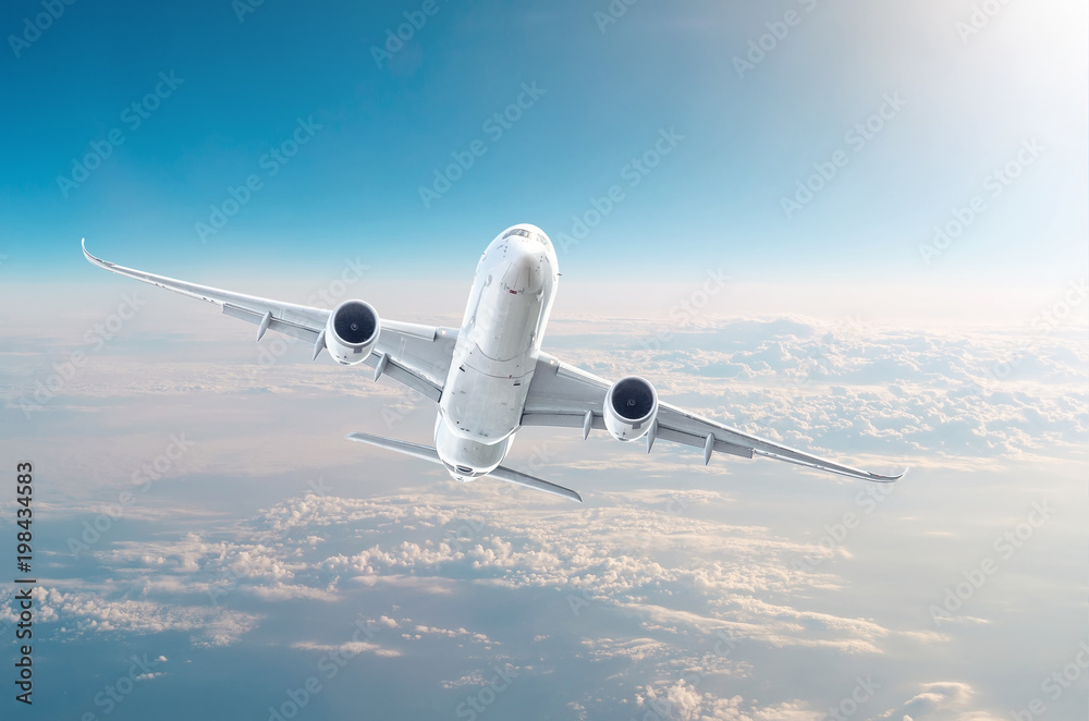 The passenger widebody airplane is climbing high flight level in the ...