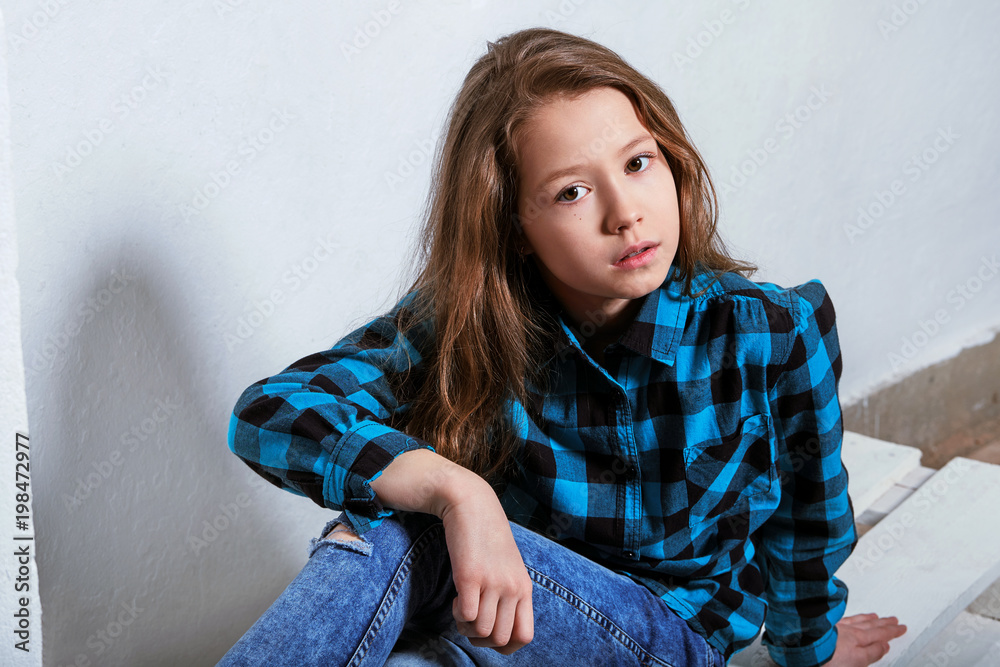 Portrait fashion beautiful teen girl posing in loft studio.Face beauty ...