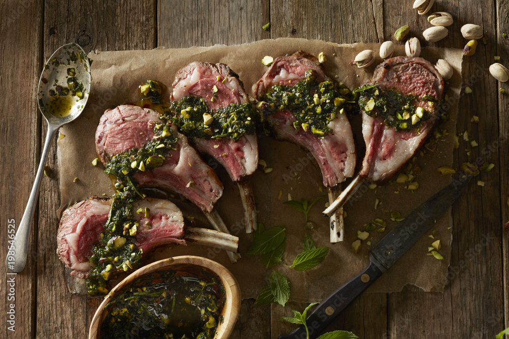 Overhead view of lamb chops prepared with pesto sauce Stock Photo ...