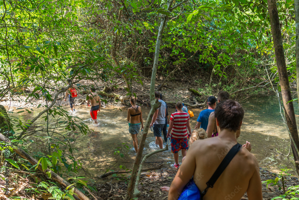Adventure trip through the jungle to the Nam Talu cave in the national ...