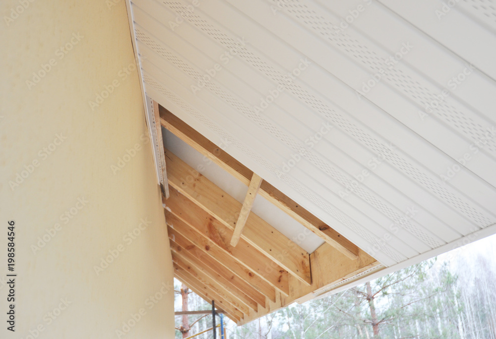 Installing soffit and fascia boards. Stock Photo | Adobe Stock