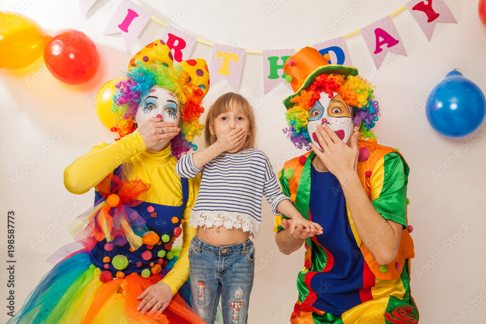clown girl and clown boy at the birthday of a child. Party for children ...